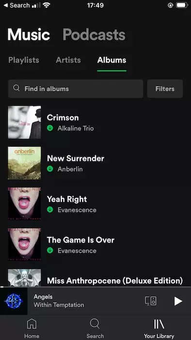 Spotify make tout chante ou telechaje ak lis ak yon iocn vèt.